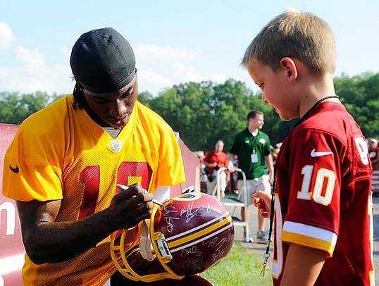 NFL Players with Fans at Training Camp - SI Kids: Sports News for Kids ...